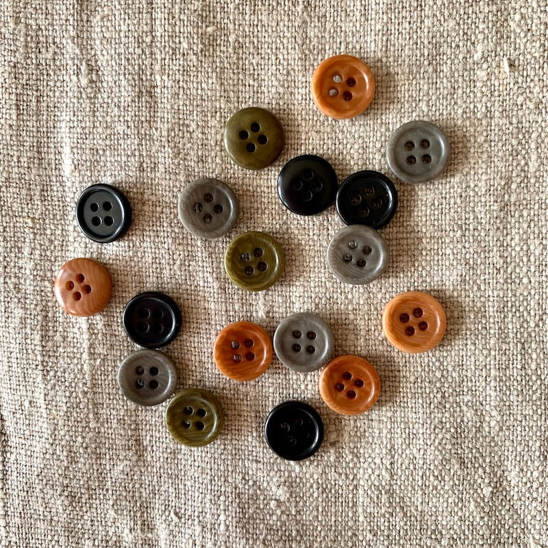 Corozo 4 hole button with rim — Loop Knitting